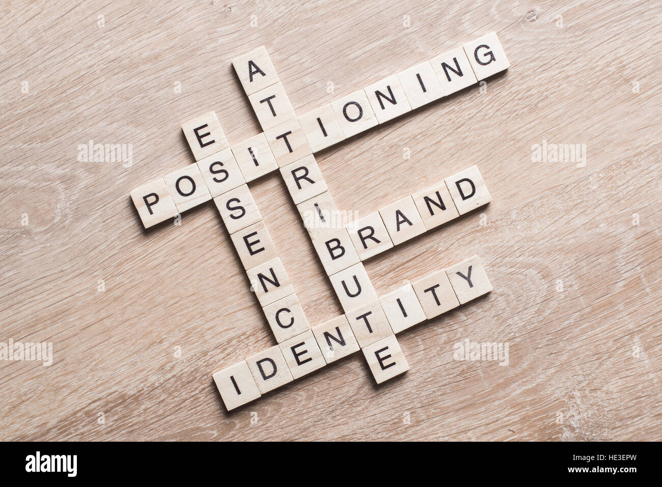 Conceptual business keywords on table with elements of game making ...