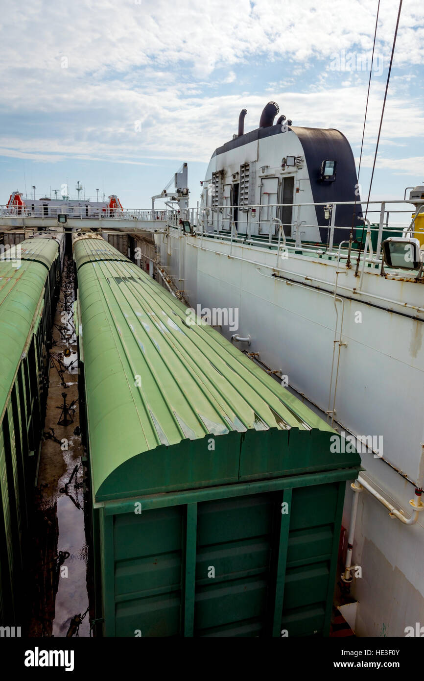train loaded on the cargo vessel on the sea Stock Photo - Alamy