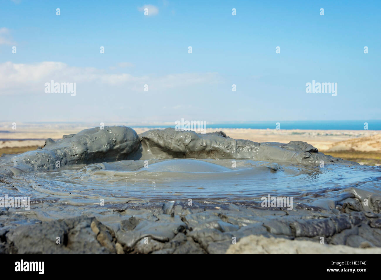 Mud volcano erupting mud bubble, Gobustan, Azerbaijan Stock Photo - Alamy