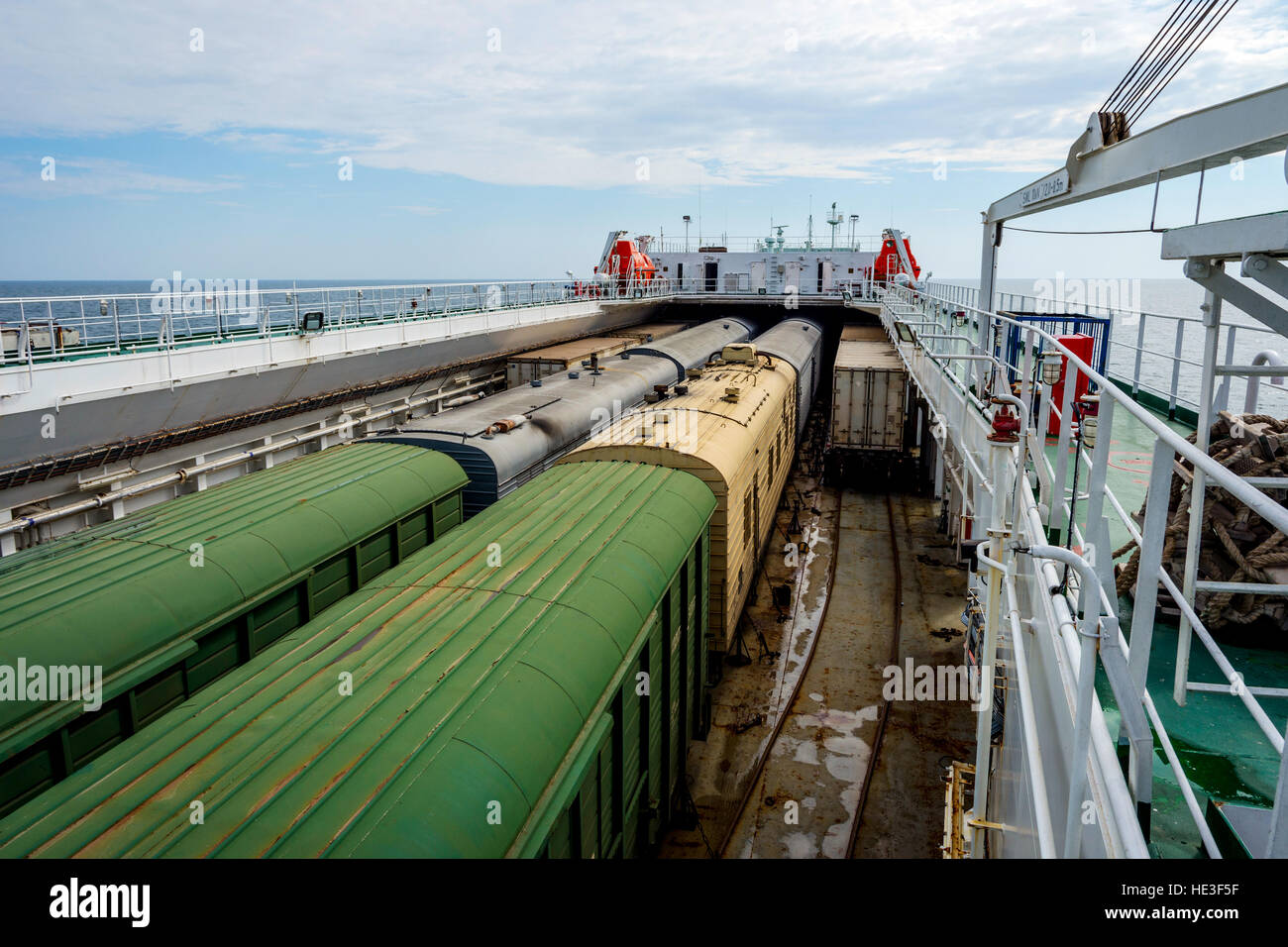 train loaded on the cargo vessel on the sea Stock Photo - Alamy