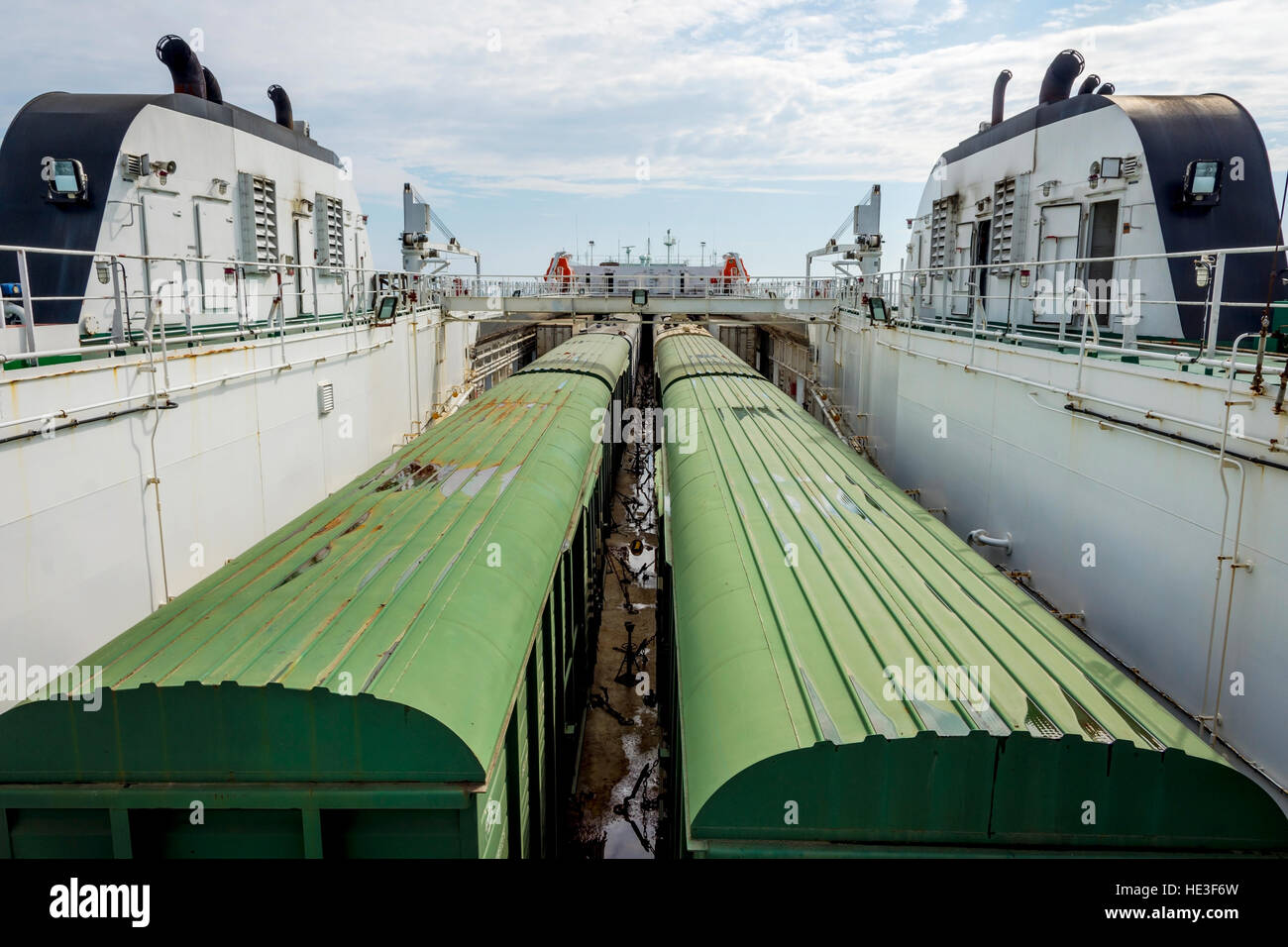 train loaded on the cargo vessel on the sea Stock Photo - Alamy