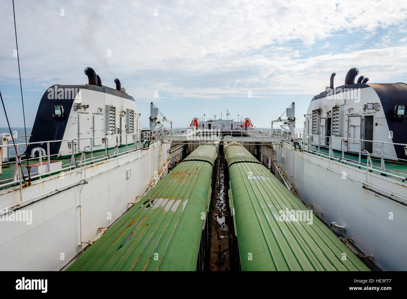 train loaded on the cargo vessel on the sea Stock Photo - Alamy