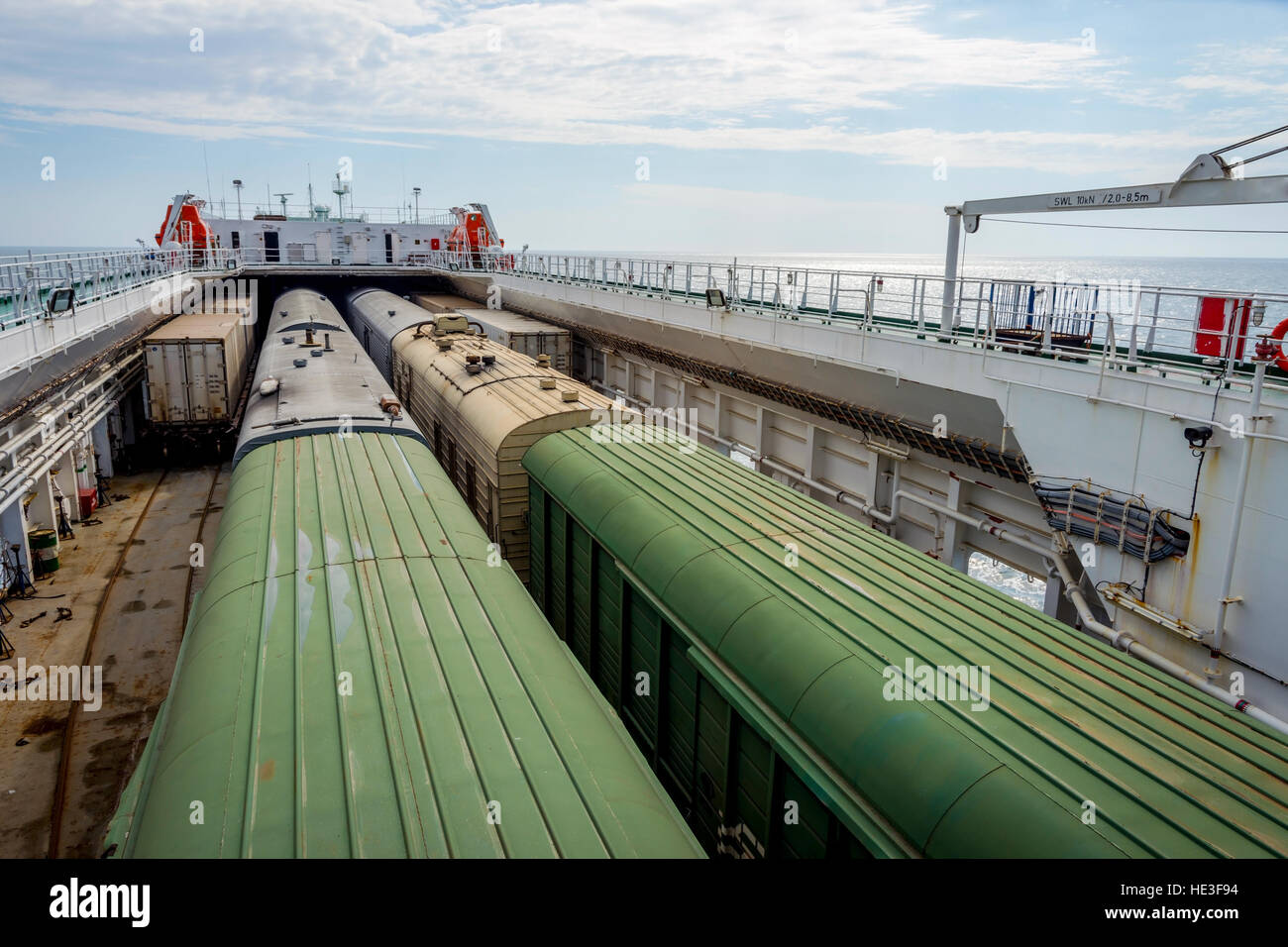 train loaded on the cargo vessel on the sea Stock Photo - Alamy