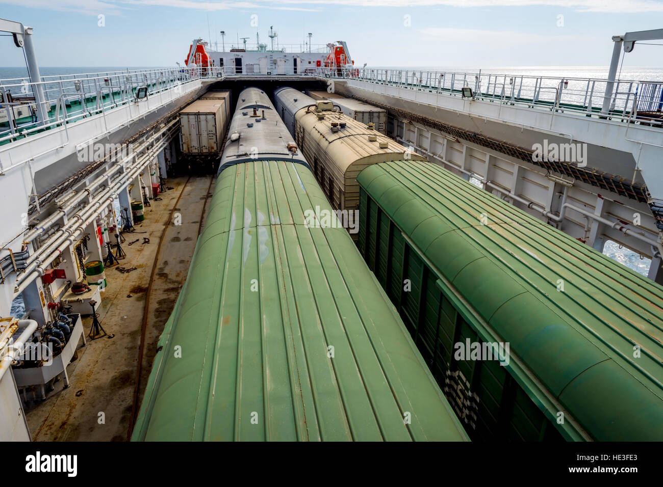 train loaded on the cargo vessel on the sea Stock Photo - Alamy