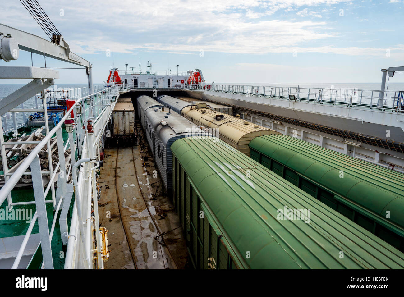 train loaded on the cargo vessel on the sea Stock Photo - Alamy