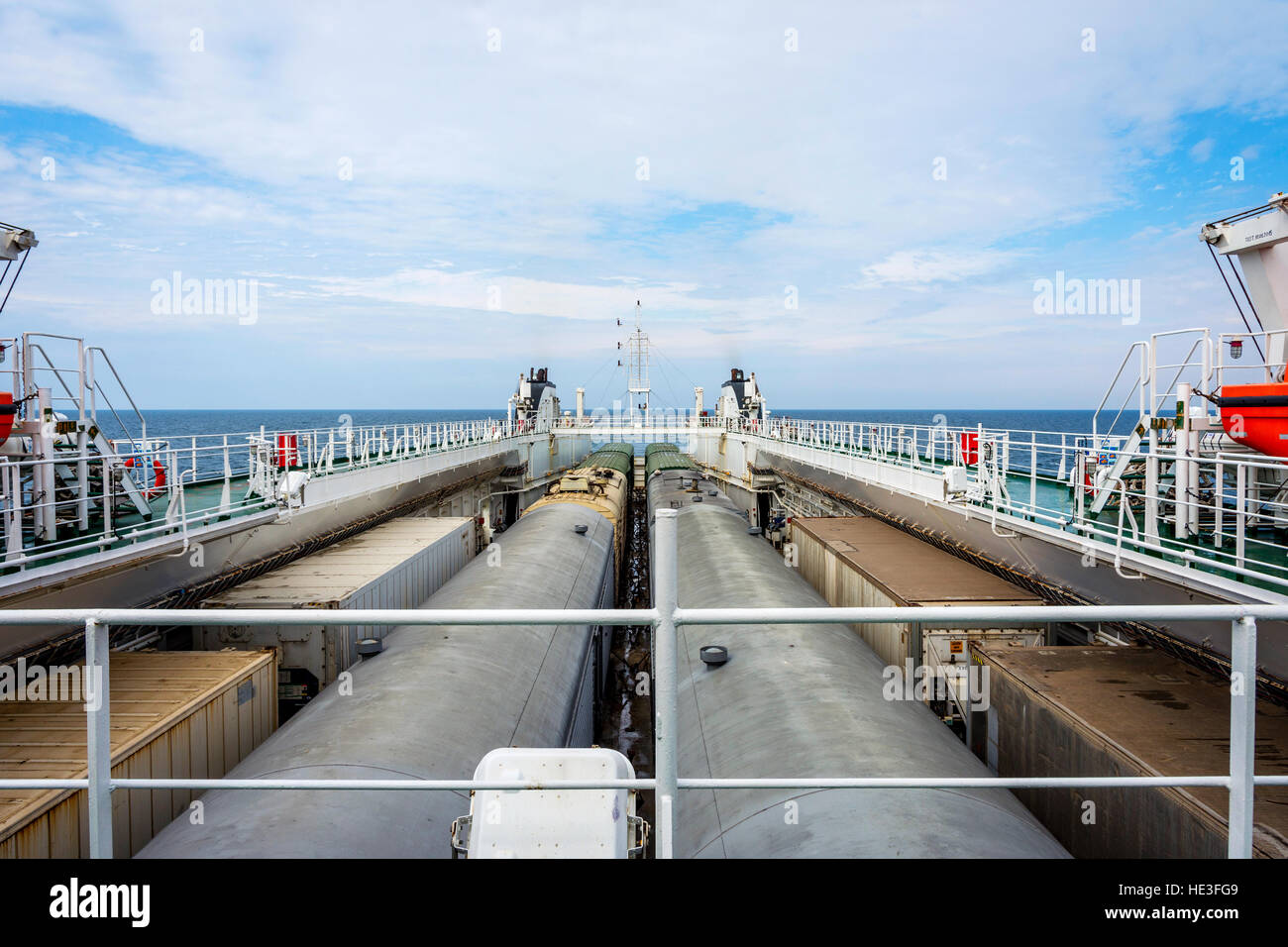 train loaded on the cargo vessel on the sea Stock Photo - Alamy