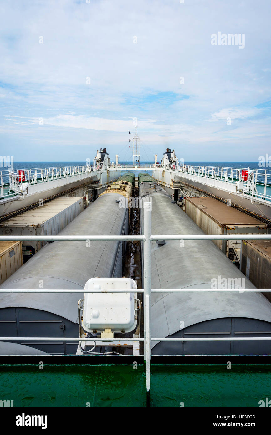 train loaded on the cargo vessel on the sea Stock Photo - Alamy