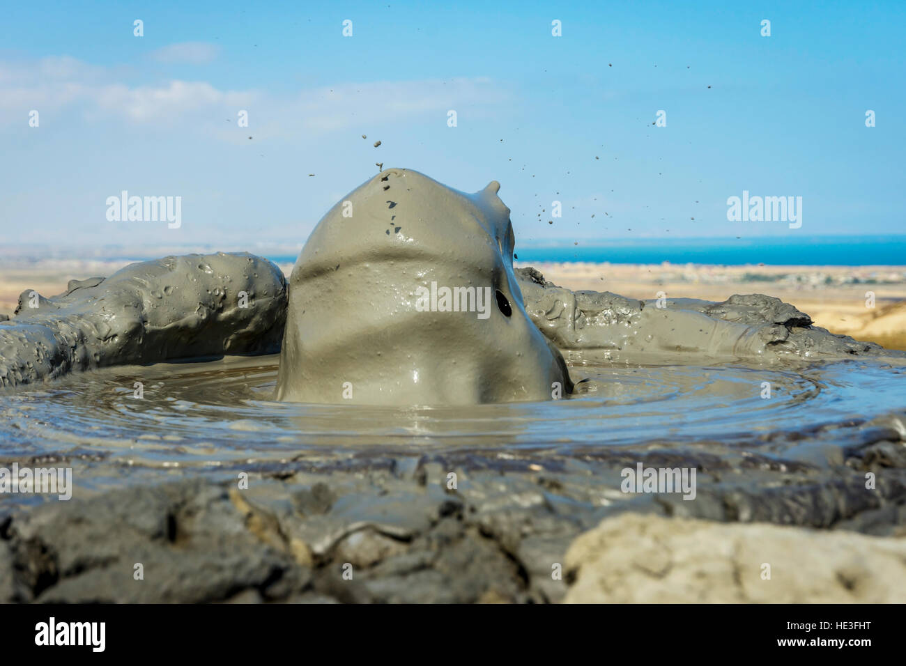 Mud volcano erupting mud bubble, Gobustan, Azerbaijan Stock Photo - Alamy