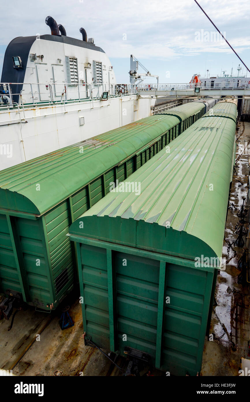 train loaded on the cargo vessel on the sea Stock Photo - Alamy