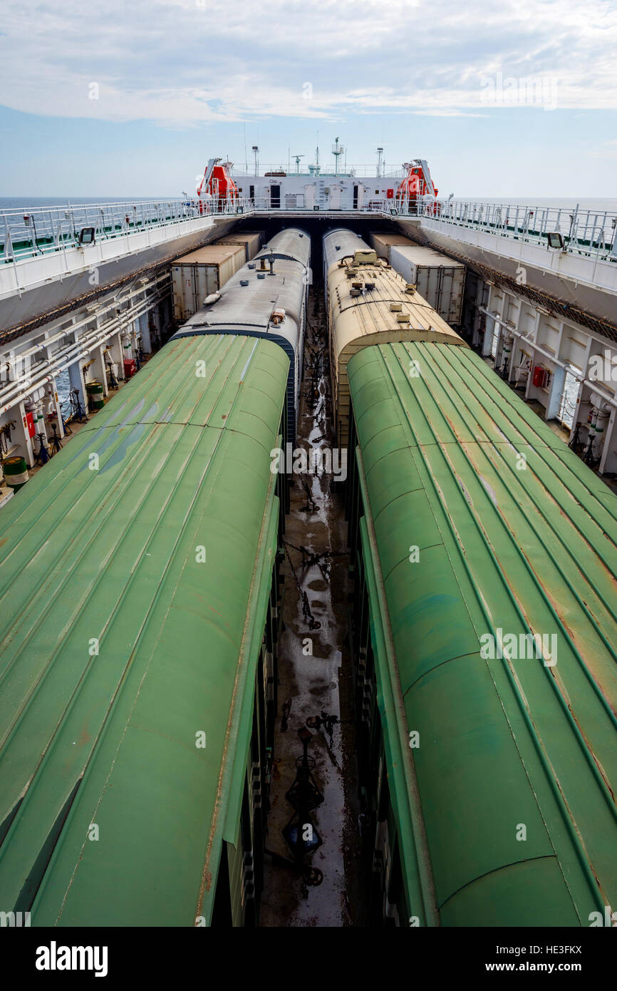 train loaded on the cargo vessel on the sea Stock Photo - Alamy