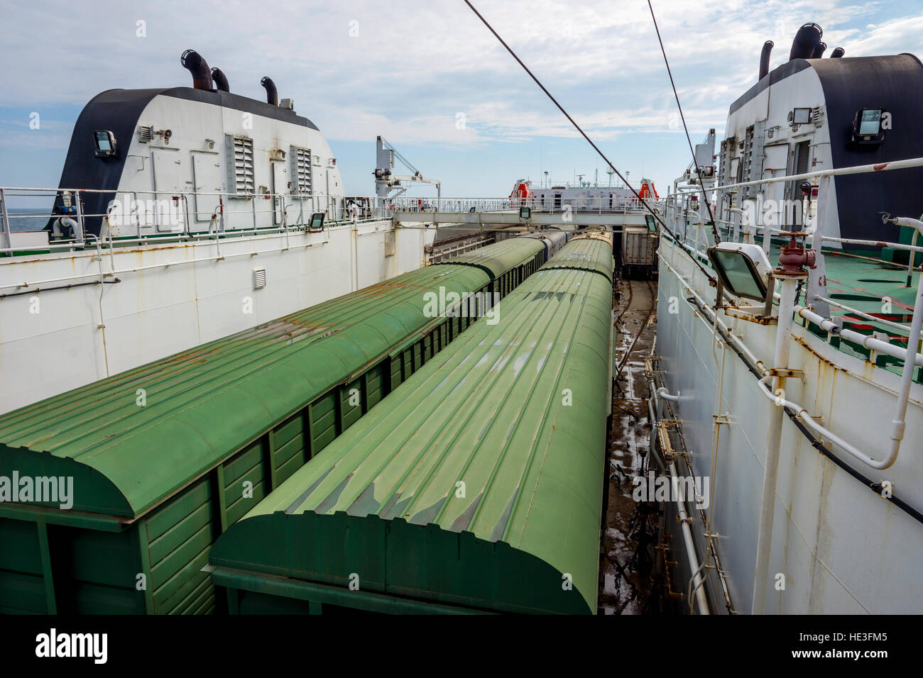 train loaded on the cargo vessel on the sea Stock Photo - Alamy
