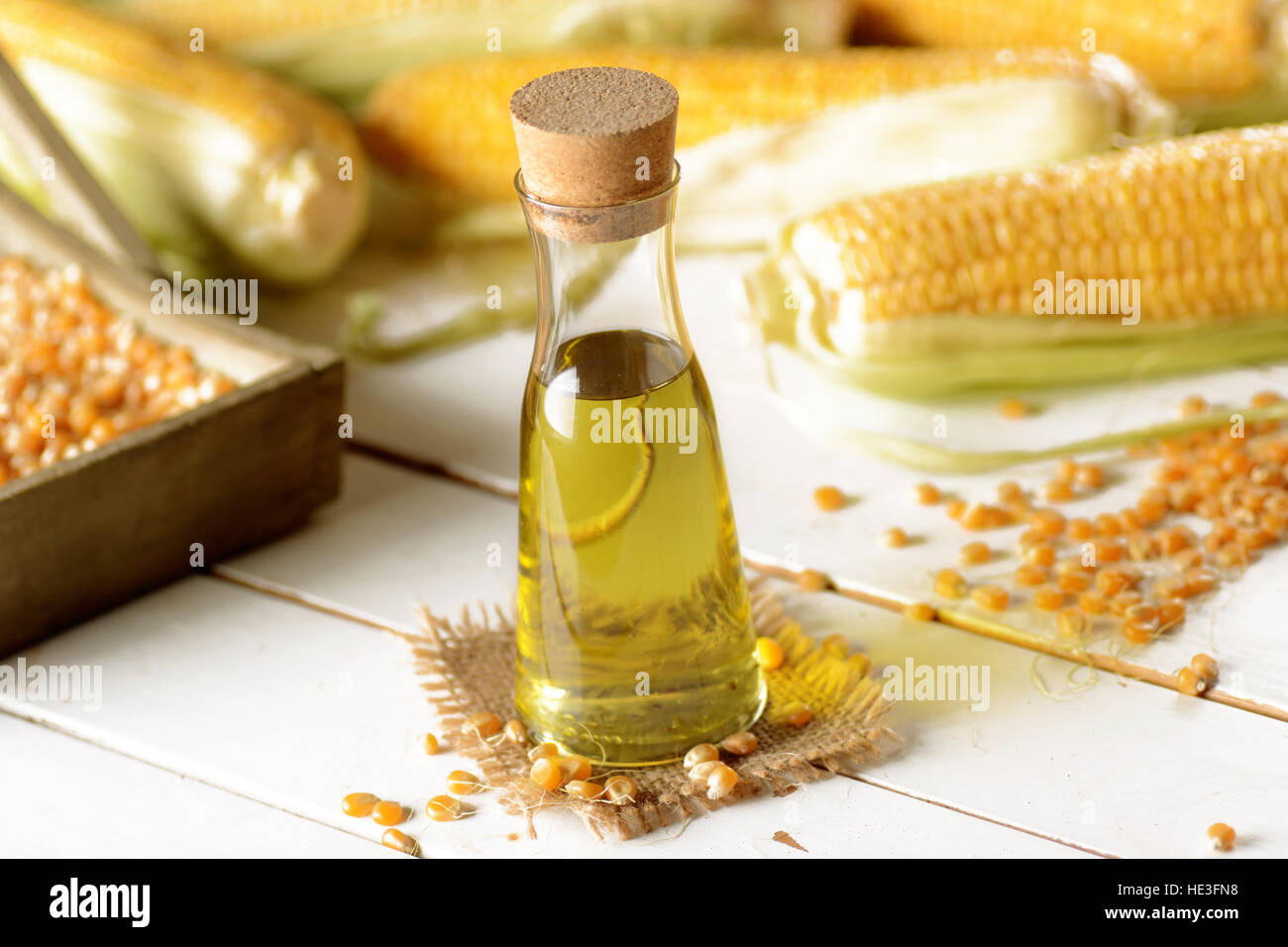 corn oil in the bottle with the cobs around Stock Photo - Alamy
