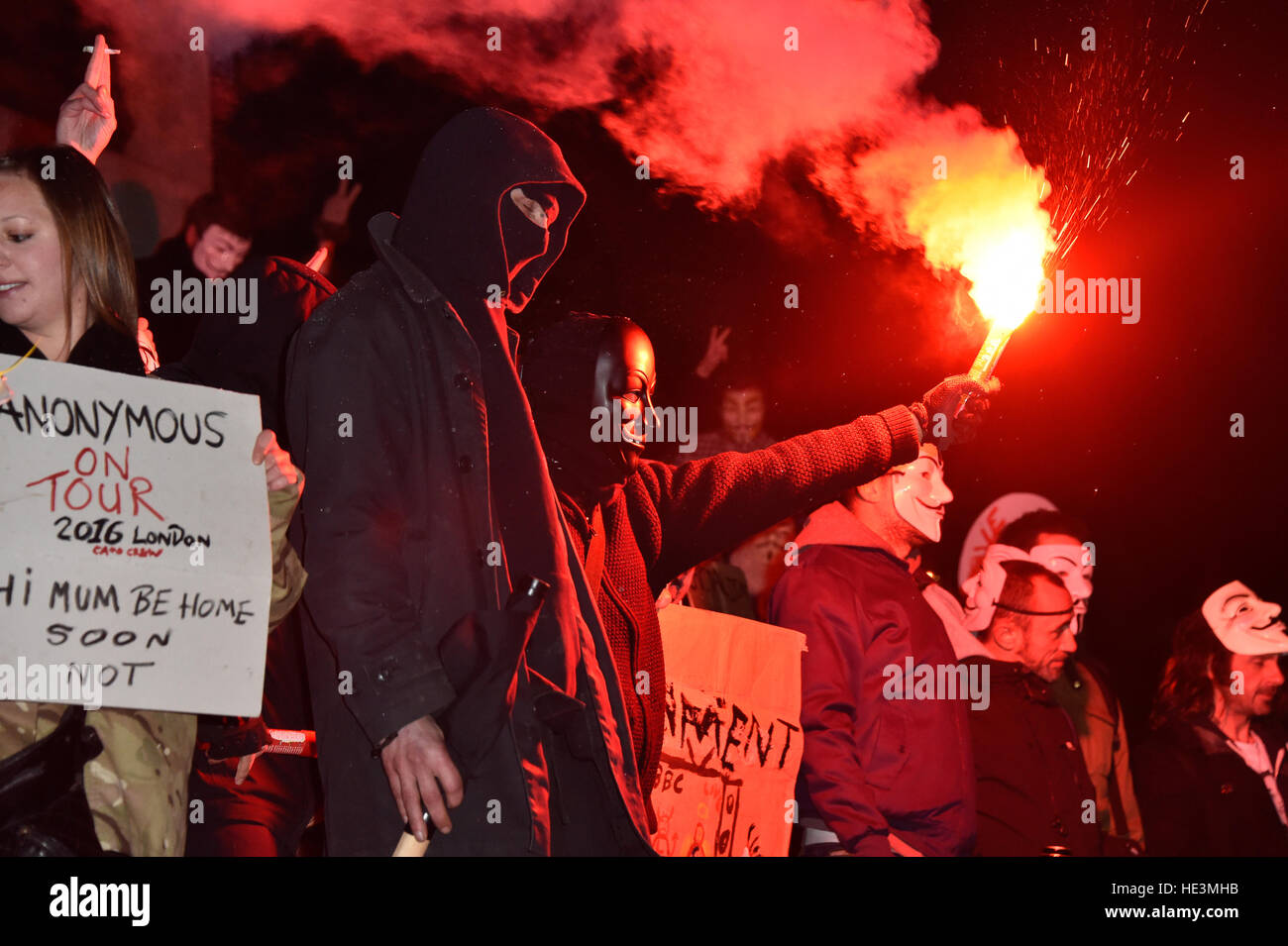 Protesters take part in the Million Mask March in Central London on ...