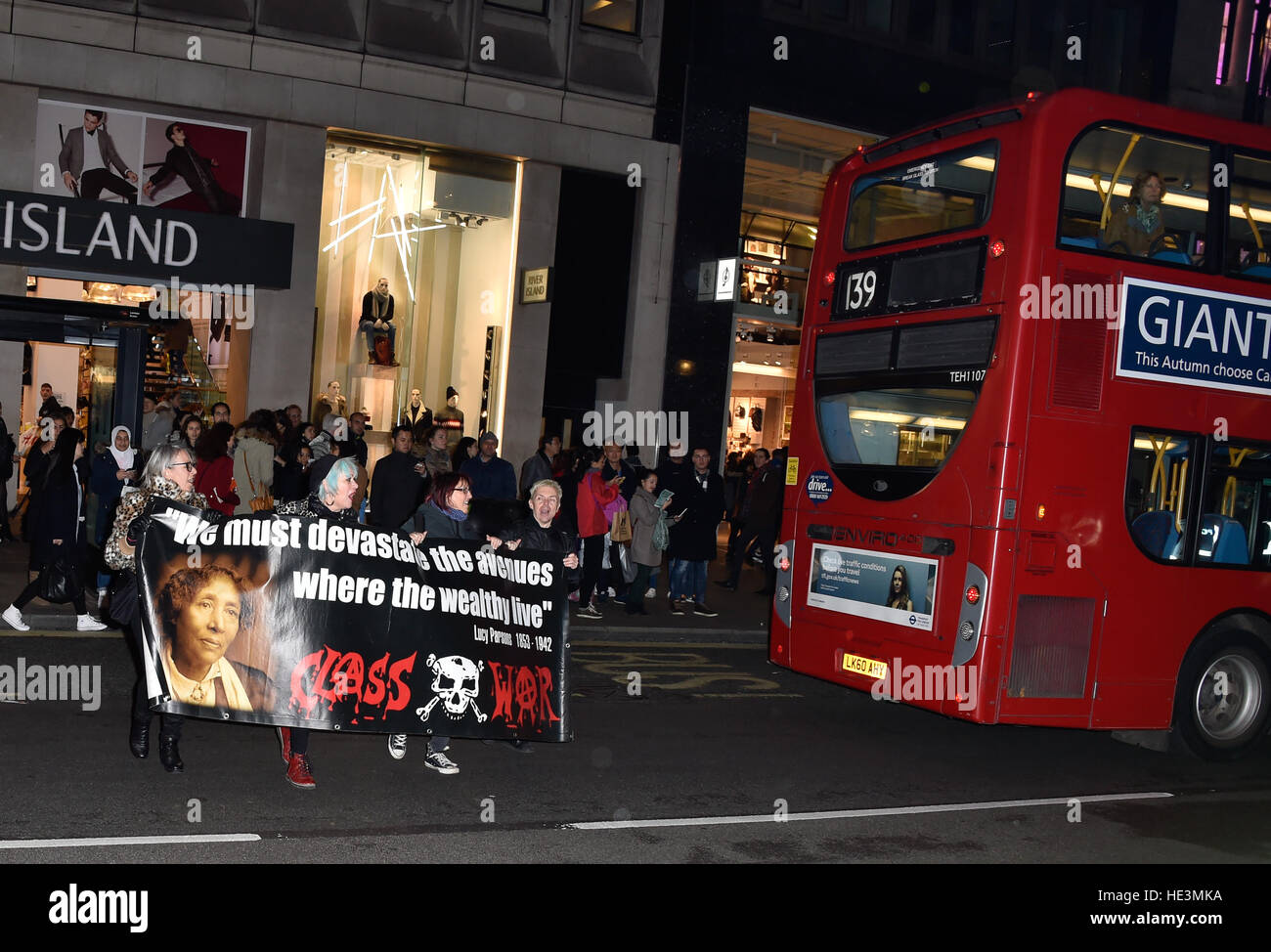 Protesters gather outside the John Lewis store on Oxford Street to ...