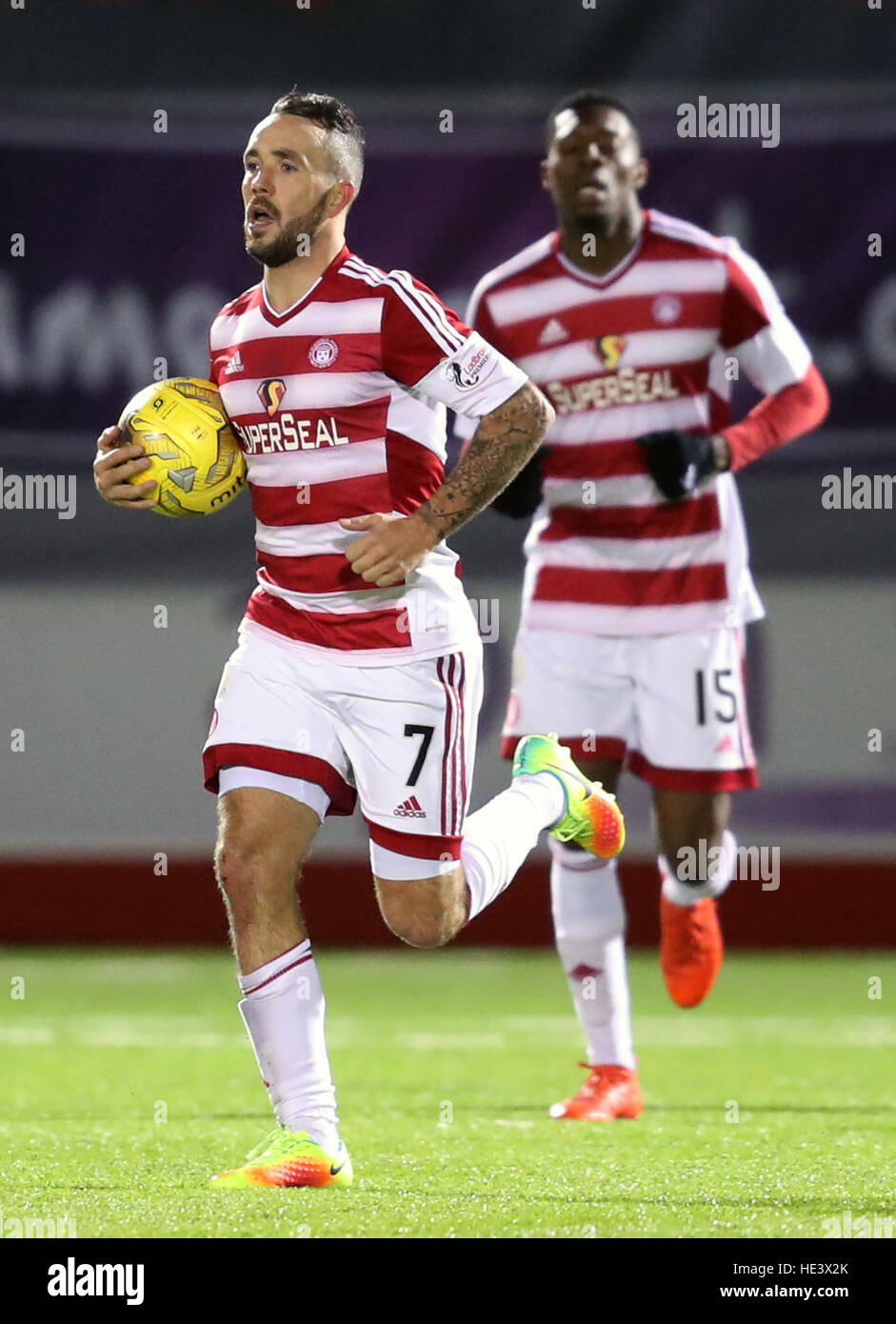 Hamilton Academical's Dougie Imrie runs back to the centre circle with ...