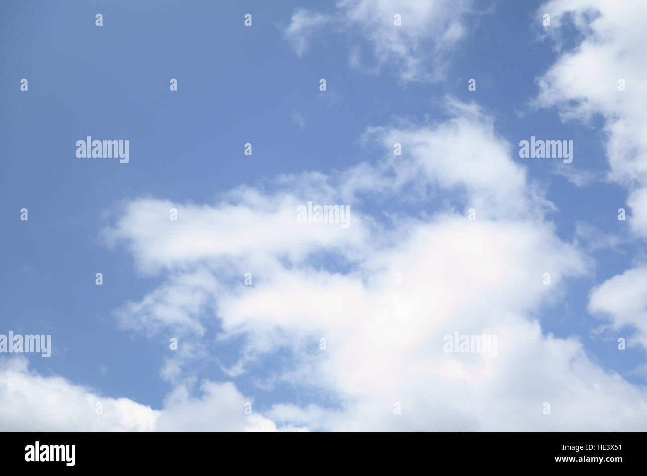 white clouds floating on a background of blue sky Stock Photo - Alamy