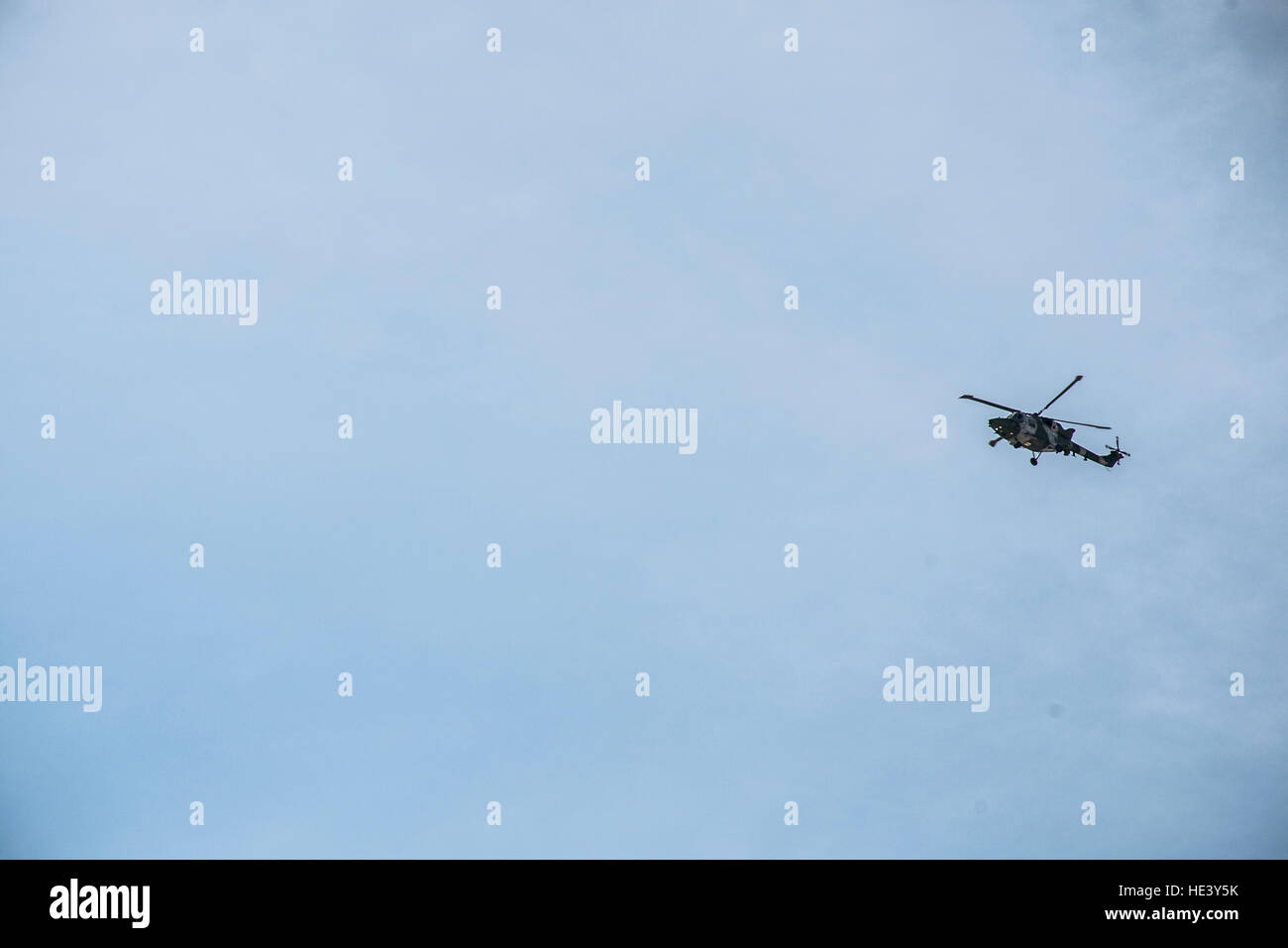 Oman in dhofar region Military helicopter flying blue sky Stock Photo ...