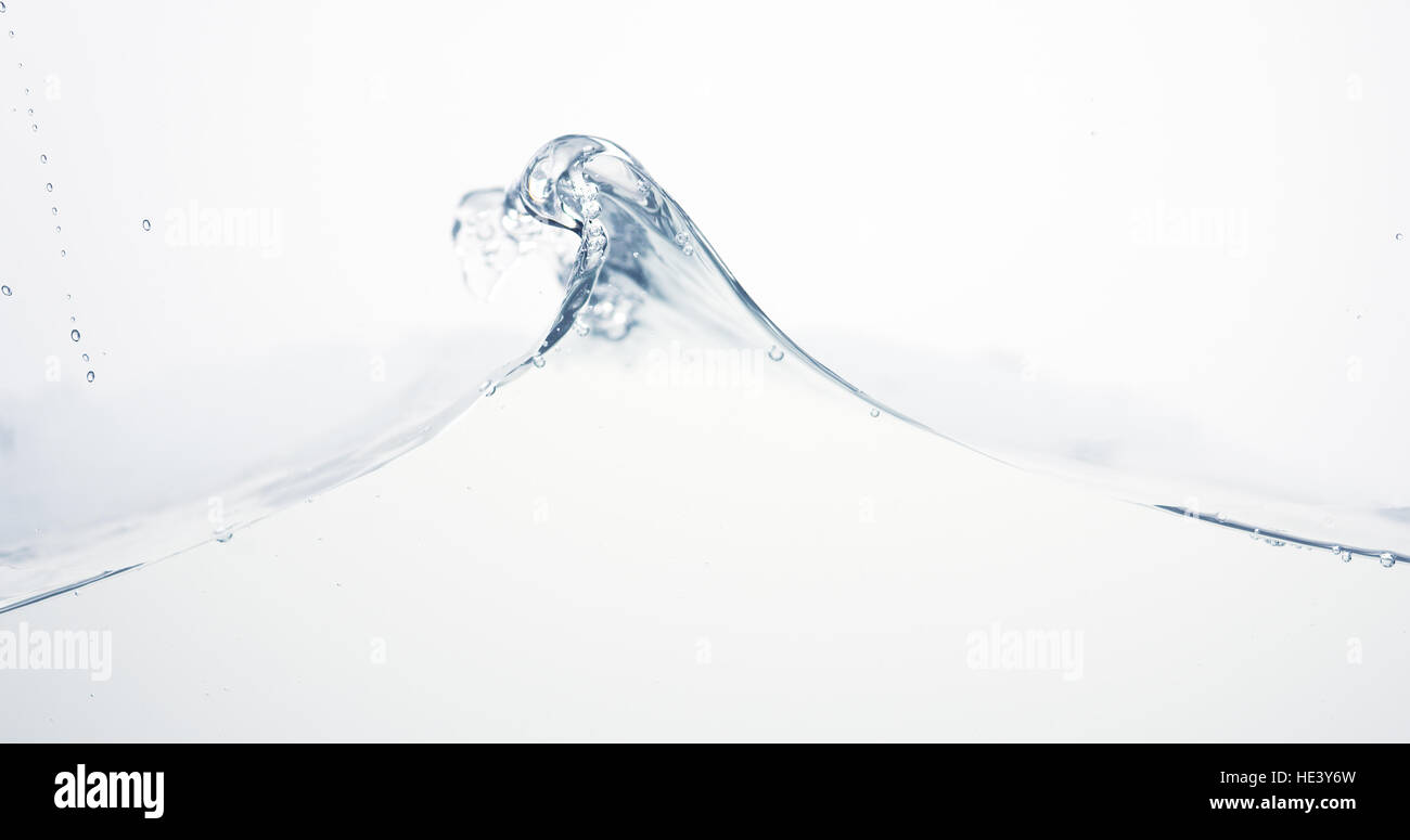 clear blue water waves and splashes side view Stock Photo - Alamy