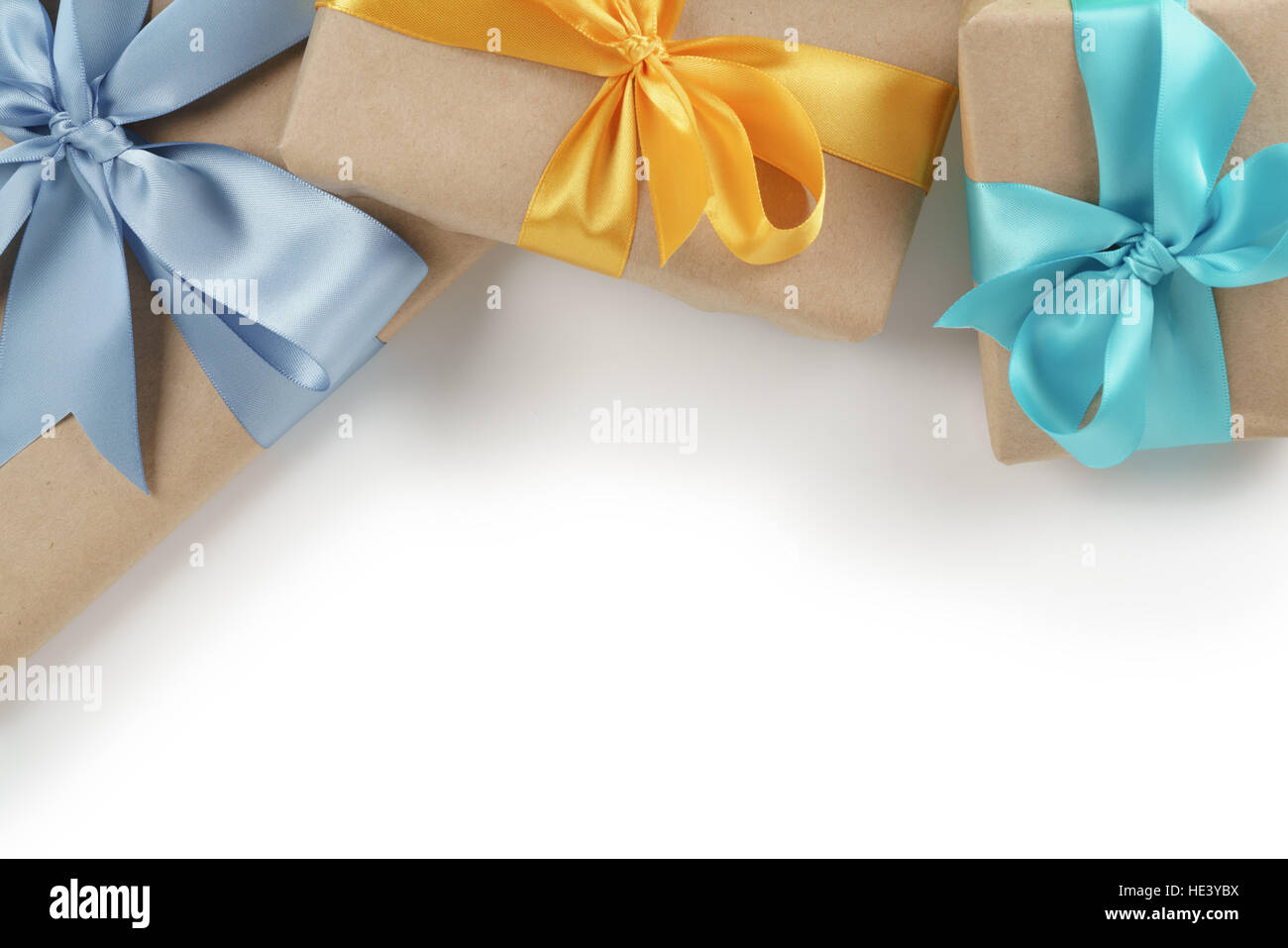 rustic gift boxes with ribbons on white background Stock Photo - Alamy