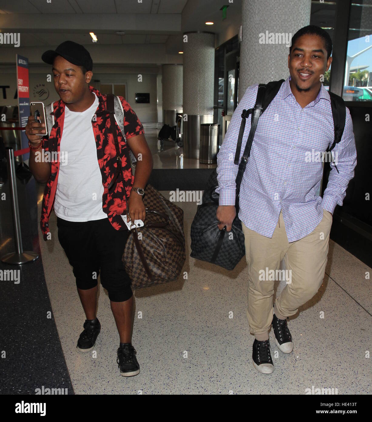 Christopher Massey and a friend depart from Los Angeles International ...