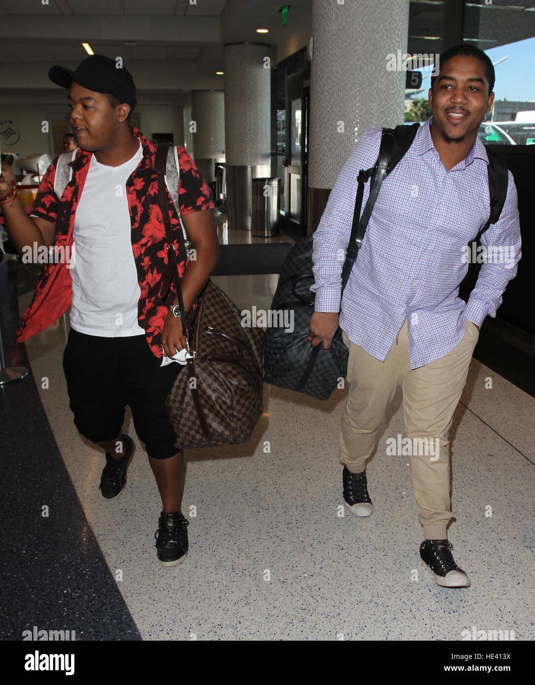 Christopher Massey and a friend depart from Los Angeles International ...