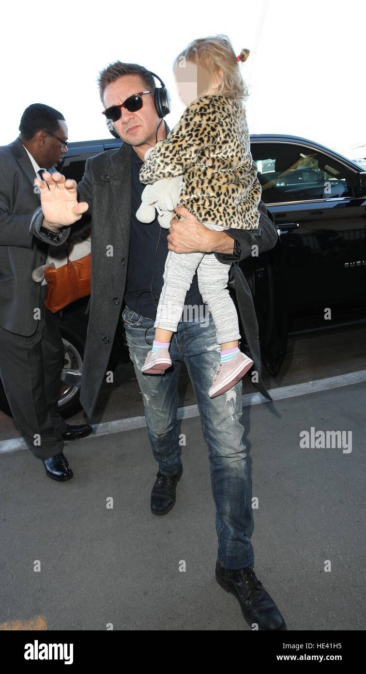Jeremy Renner at Los Angeles International Airport (LAX) with his ...