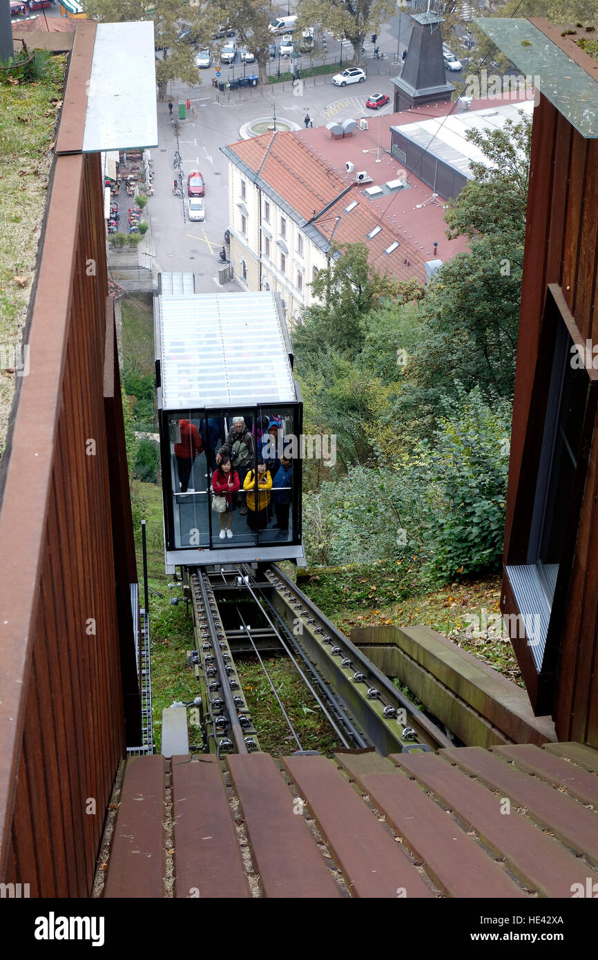 Tourists have a ride with Funicular Railway in Ljubljana, Slovenia ...