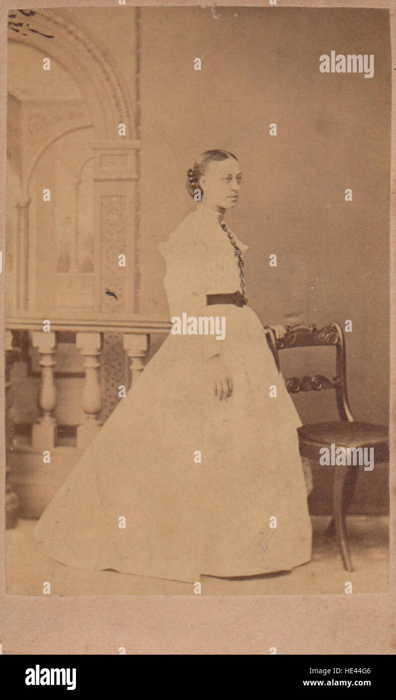 This historic photograph of Miss L Hunt offers a glimpse into the past ...