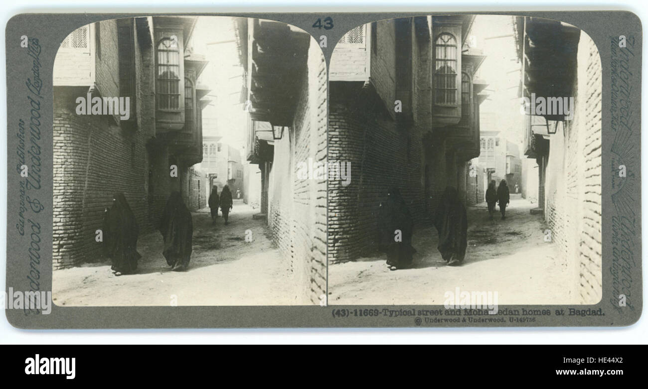 This historical image depicts typical streets and homes in Baghdad ...