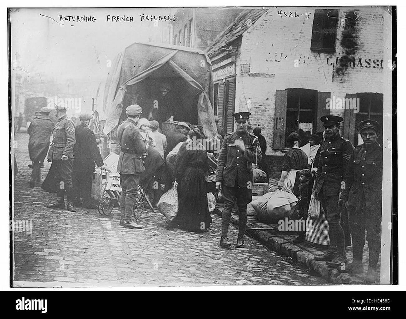 This historical image depicts the return of French refugees, reflecting ...