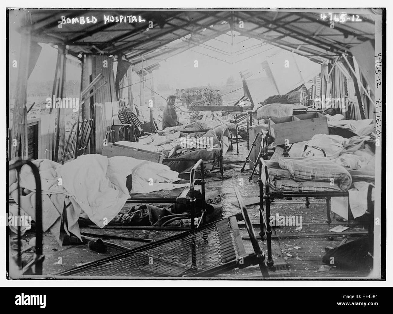 A historical image depicting a bombed hospital, showcasing the ...