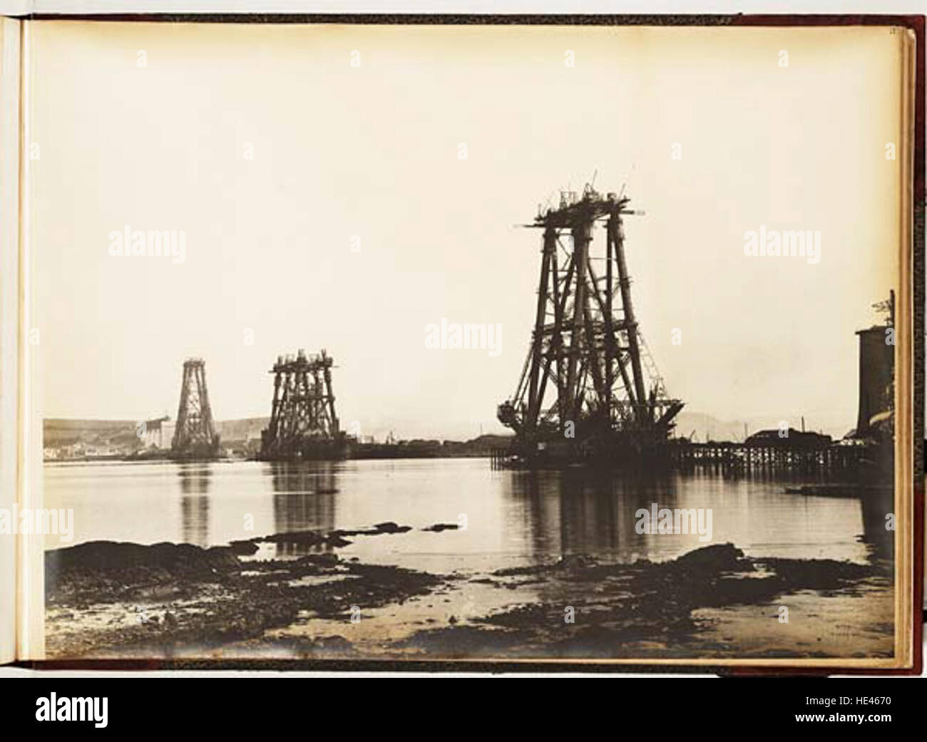 This historical photograph shows the construction of the Forth Bridge ...