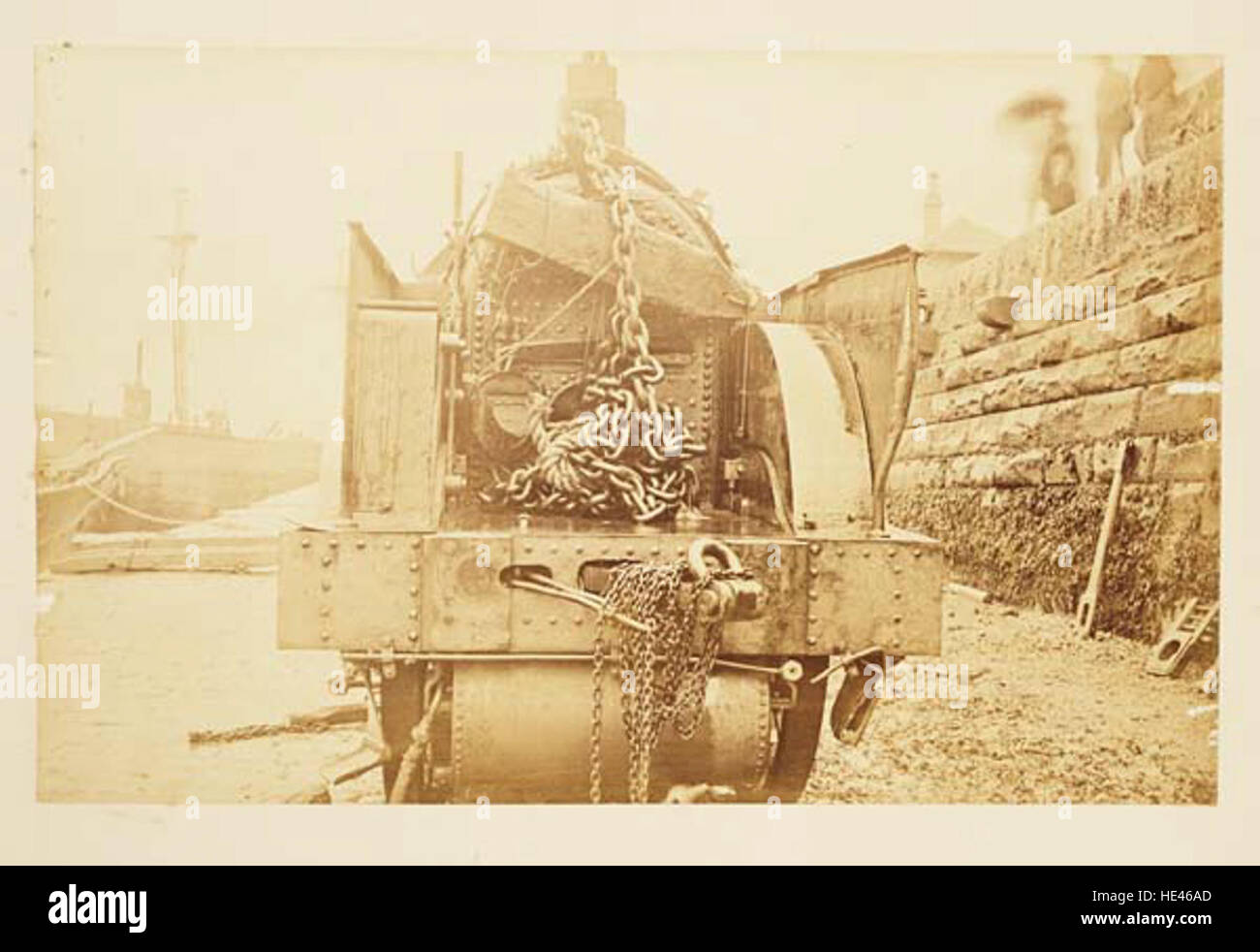 A historical photograph of a steam engine salvaged from the Tay ...