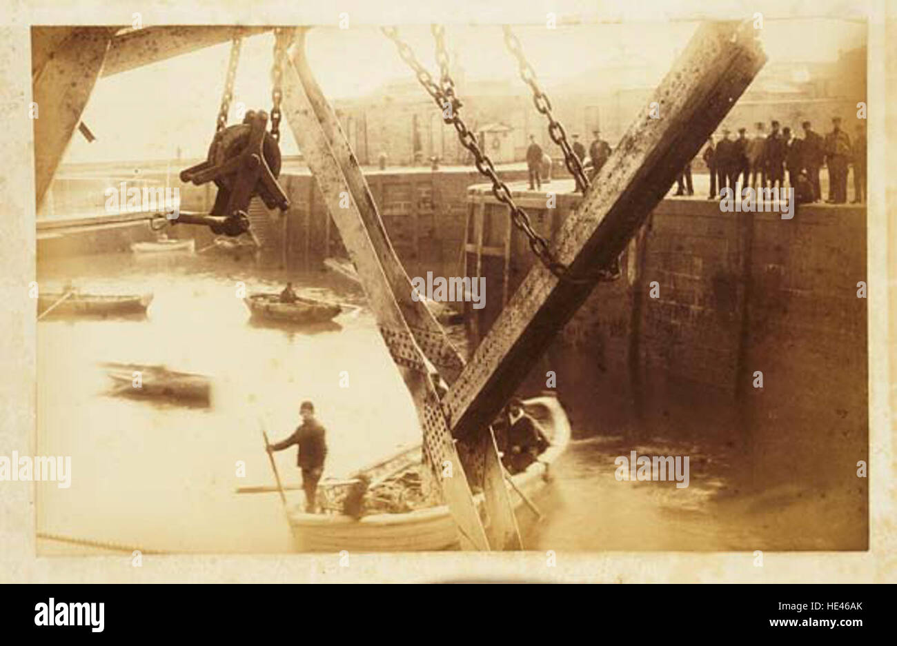 This historical image depicts men salvaging the wreckage of the Tay ...