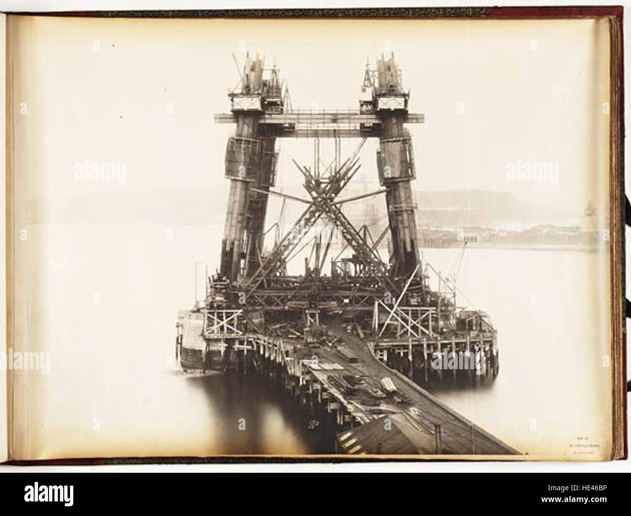 This historic photograph captures the construction of the Forth Bridge ...