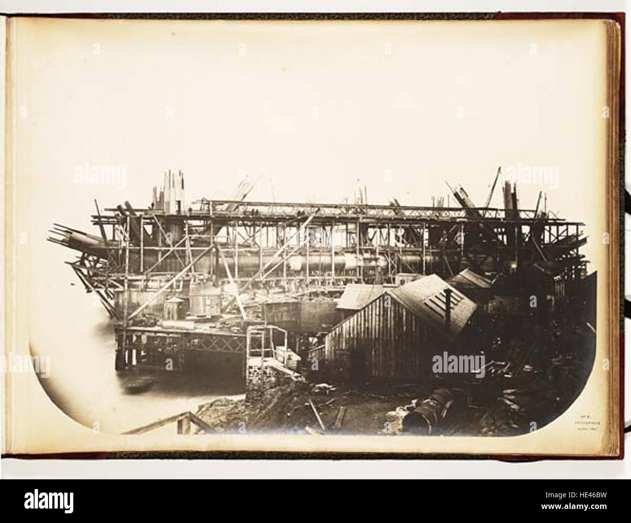The image shows the construction of the Forth Bridge with the ...