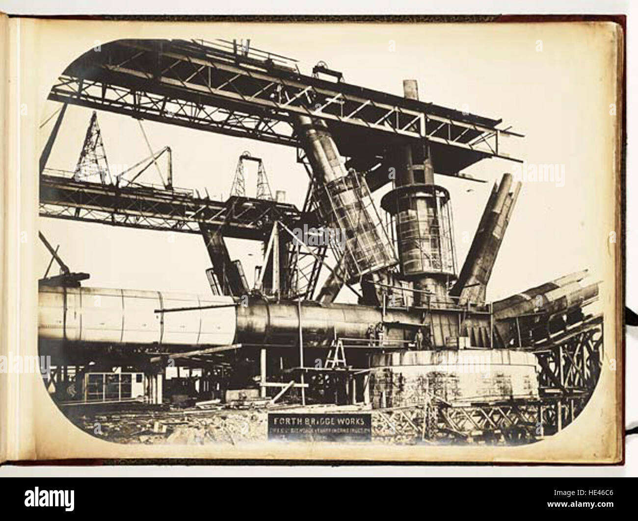 This image showcases the construction of the Forth Bridge, an iconic ...