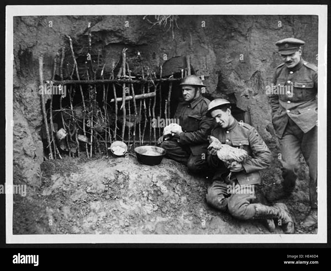 This historical image depicts a fowl house positioned just behind the ...