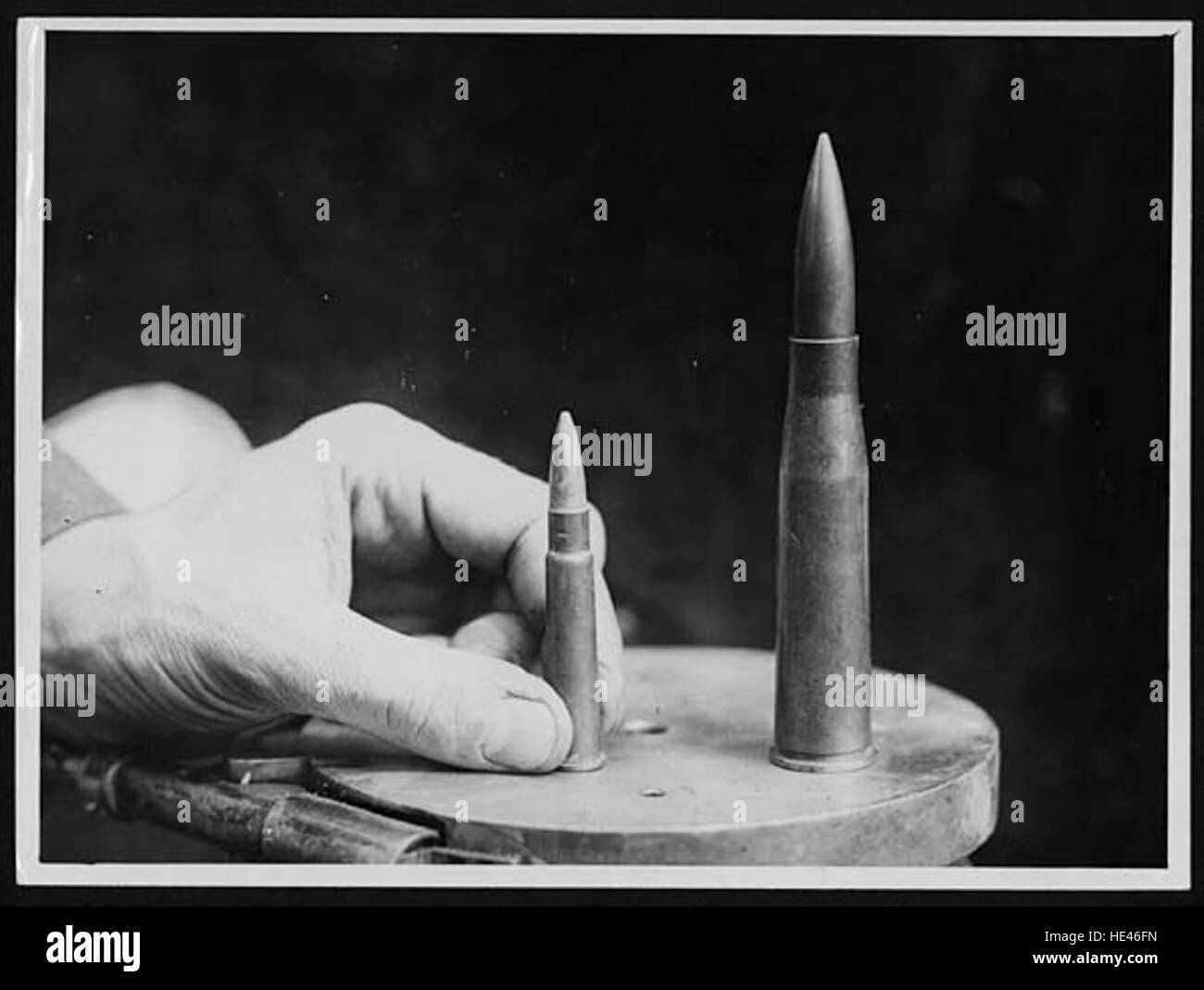 This historical image features bullets from a German anti-tank rifle ...
