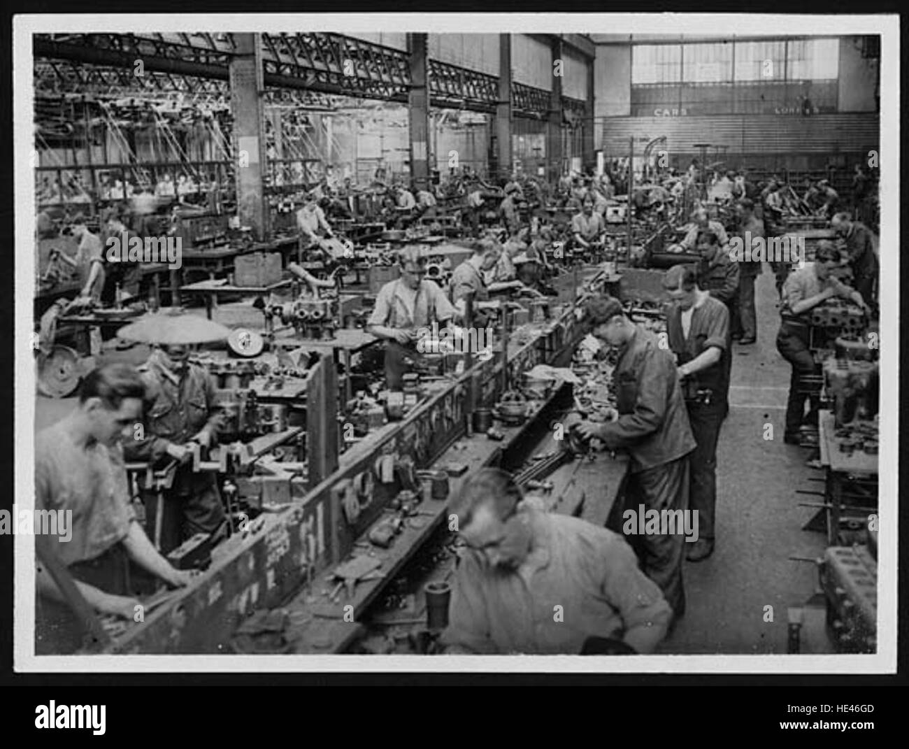 This image captures a historic lorry repair workshop in France ...