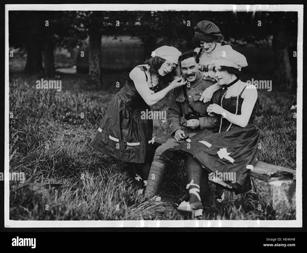 This piece captures a social gathering from a bygone era, highlighting ...