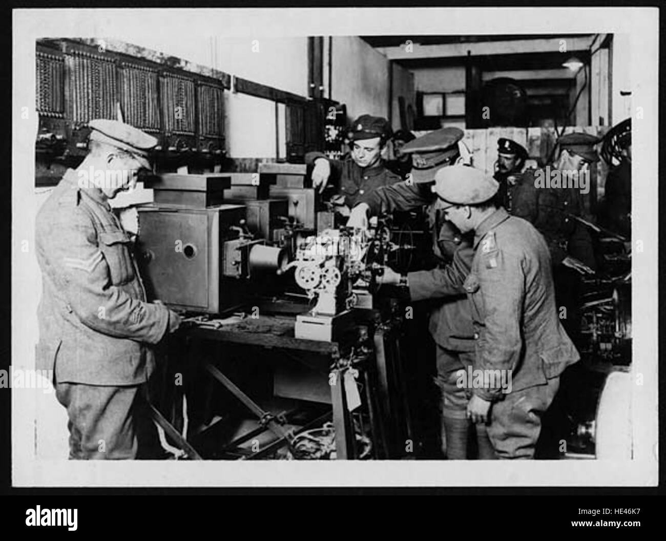This historic image shows men from the line, possibly soldiers or ...