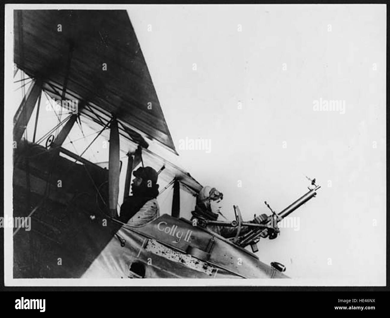 A historical photograph depicts an old-fashioned gun designed to ...