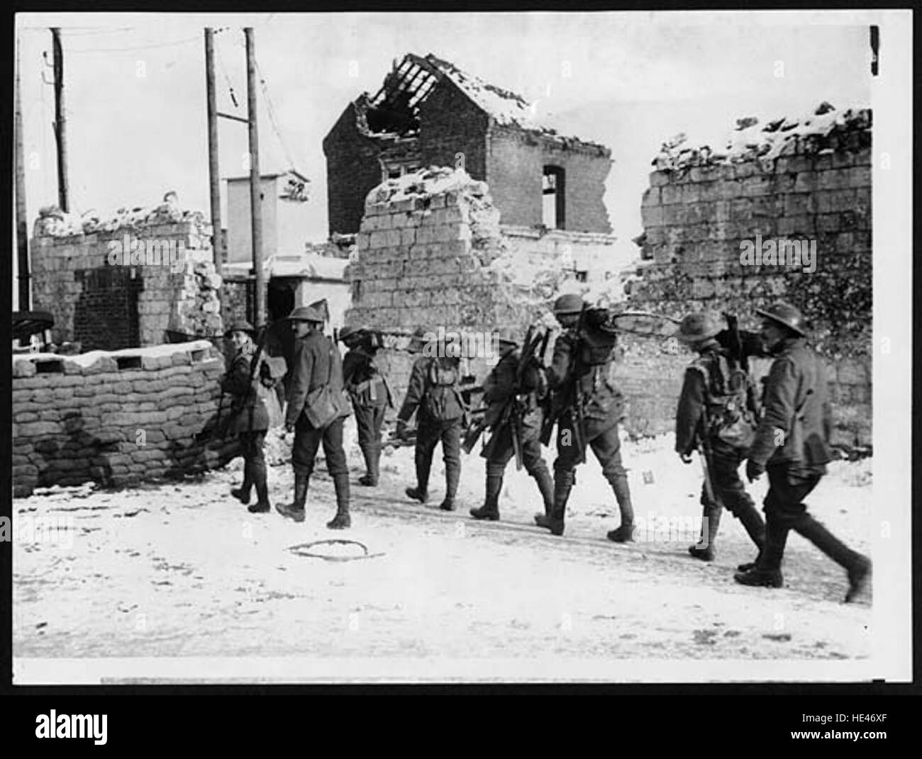 This historical photograph or painting shows a fatigue party trudging ...