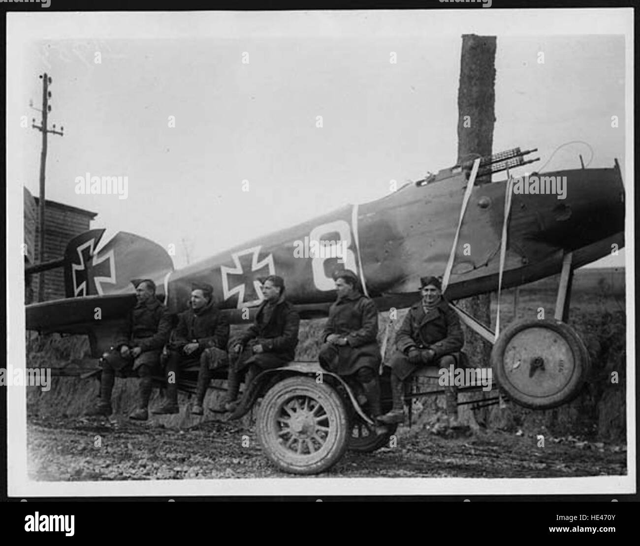 This image depicts a captured German Boche plane from World War I ...