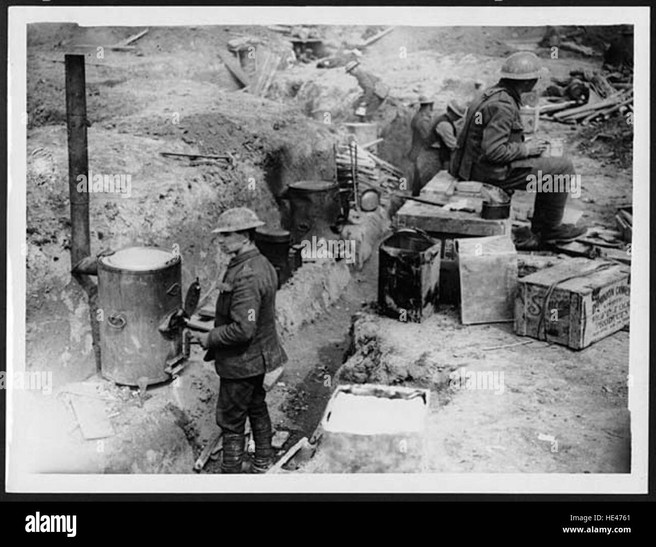 This historical image shows kitchens set up in a trench, a common sight ...