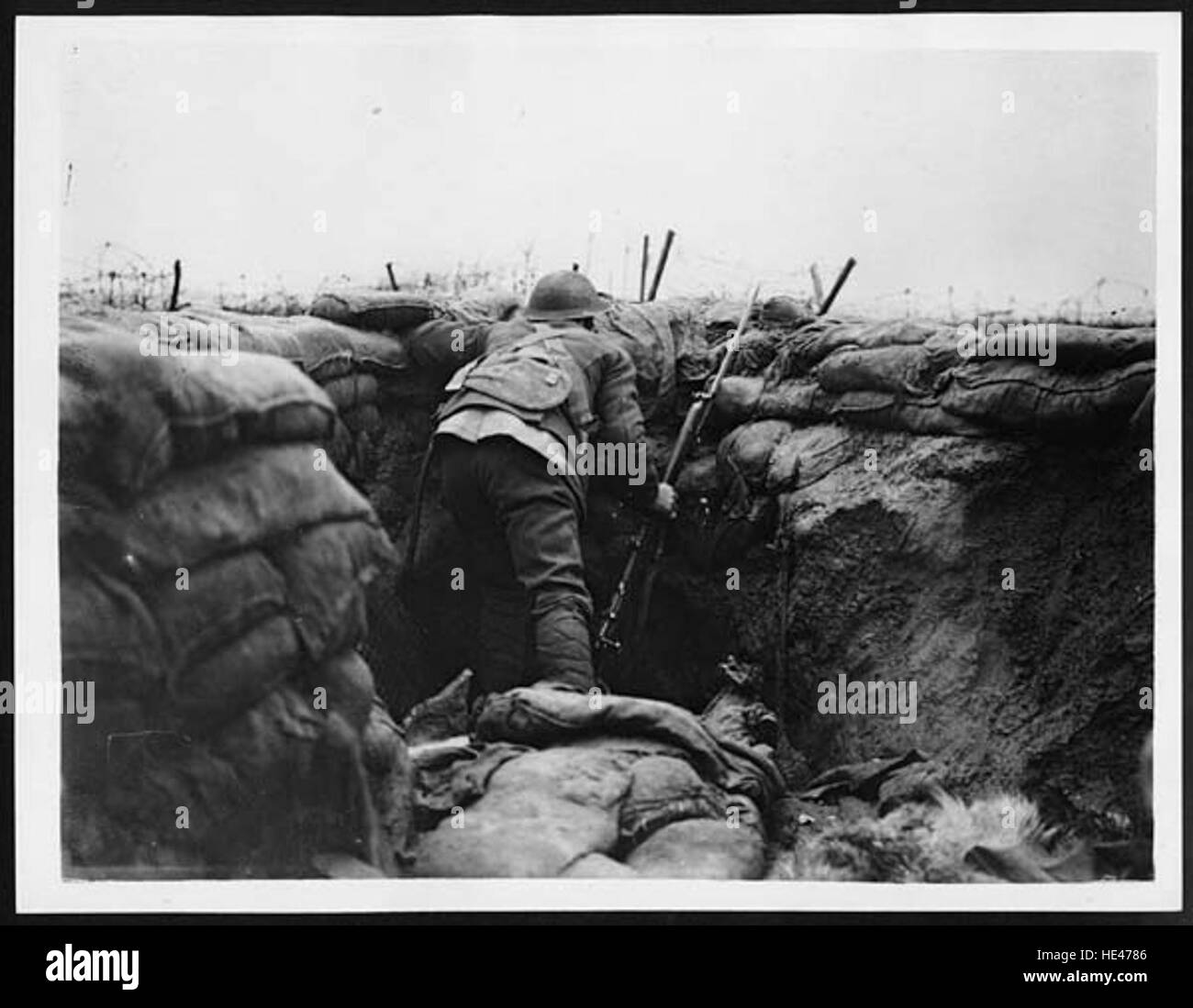 This historic image depicts a look-out position with a view of the barbed wire in No Man’s Land ...