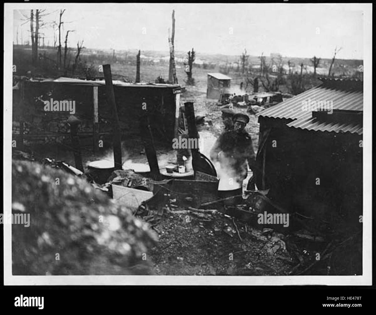 This historical photograph shows cooks working near the front lines ...