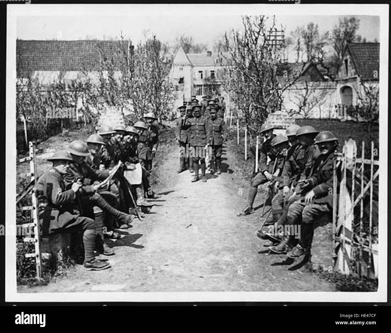A historical image of military officers engaging in conversation within ...