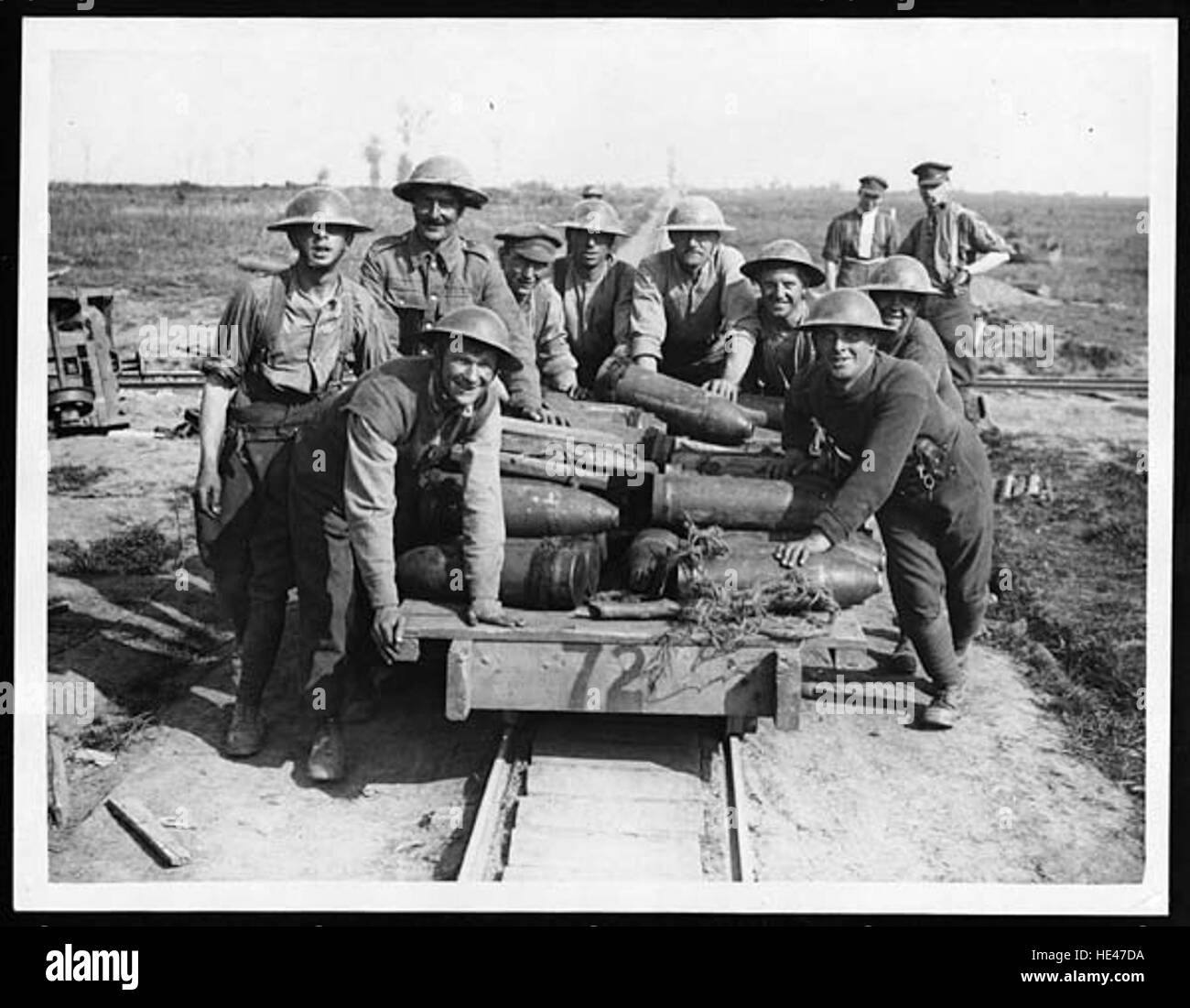 Gunners rolling up shells for a move forward Stock Photo - Alamy